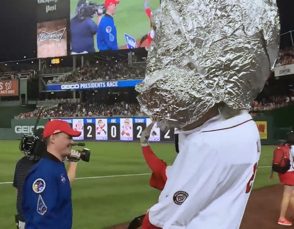 Video: Racing presidents moonwalk in tinfoil helmets for visiting ...